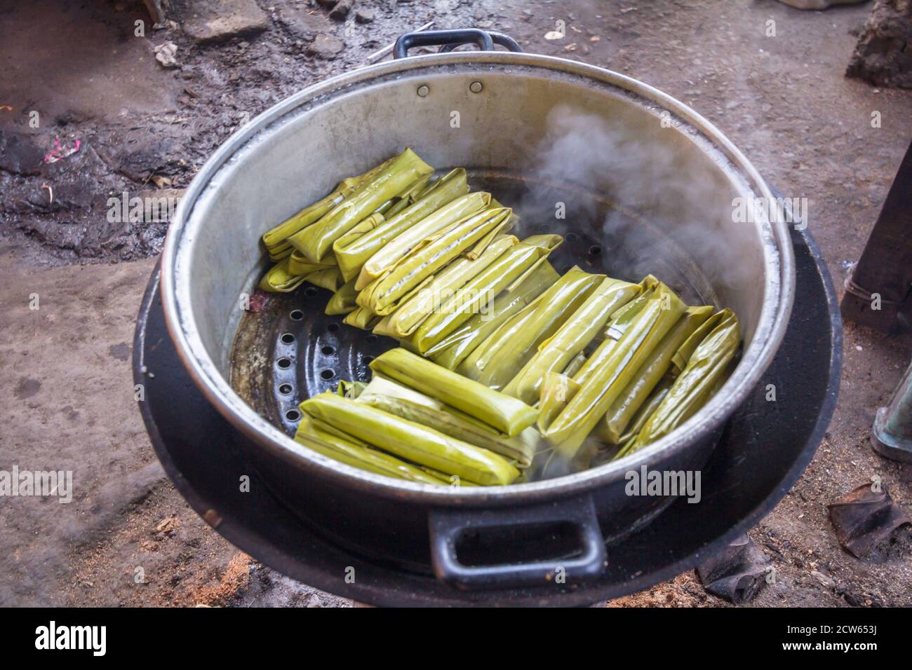 Rice cakes locally called budbud, glutinous rice wrapped in banana ...