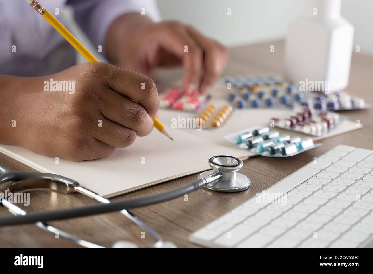 medical doctor writing prescription physician with stethoscope ...