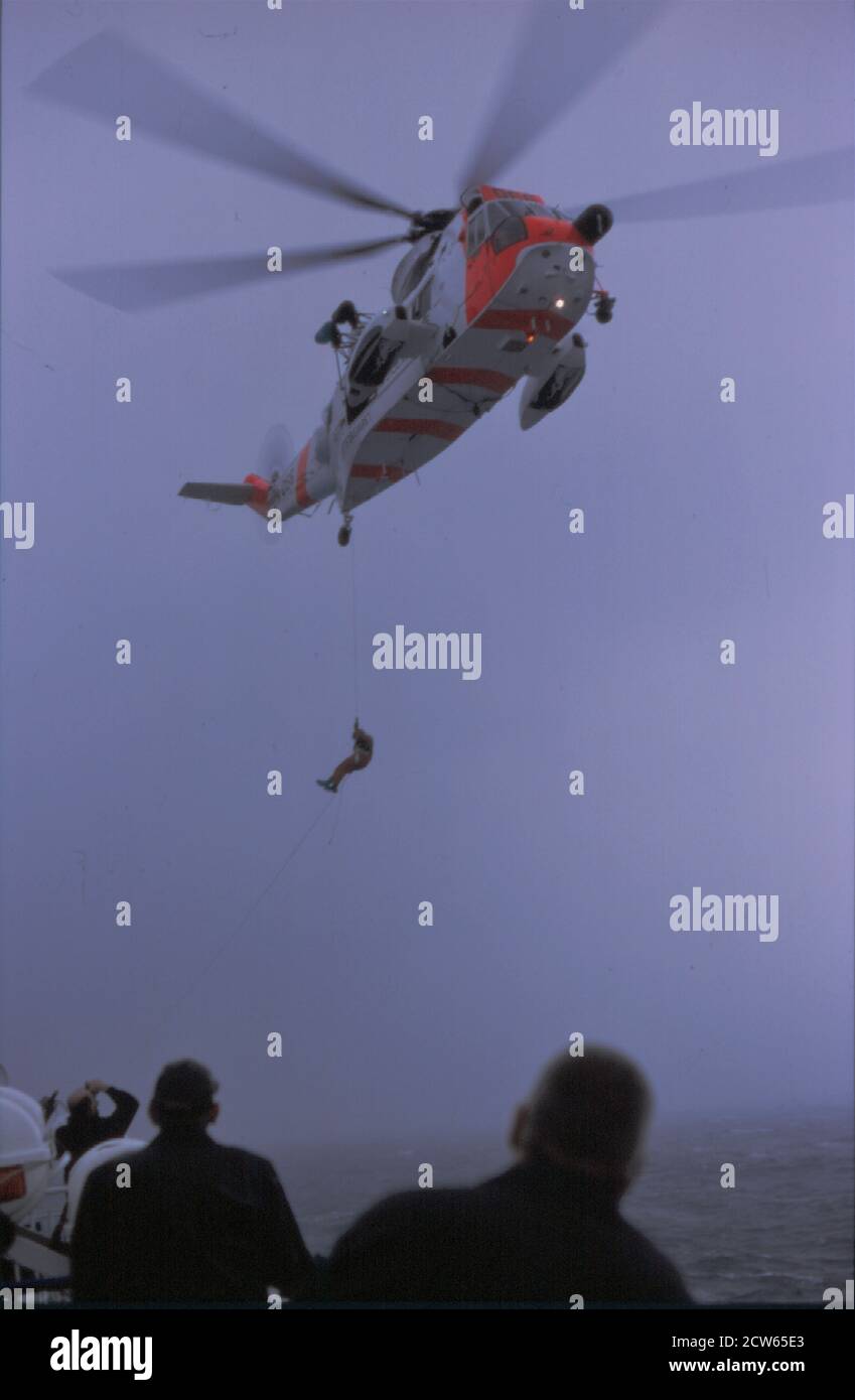 Passenger being airlifted medivacced by Norwegian helicopter rescue ...