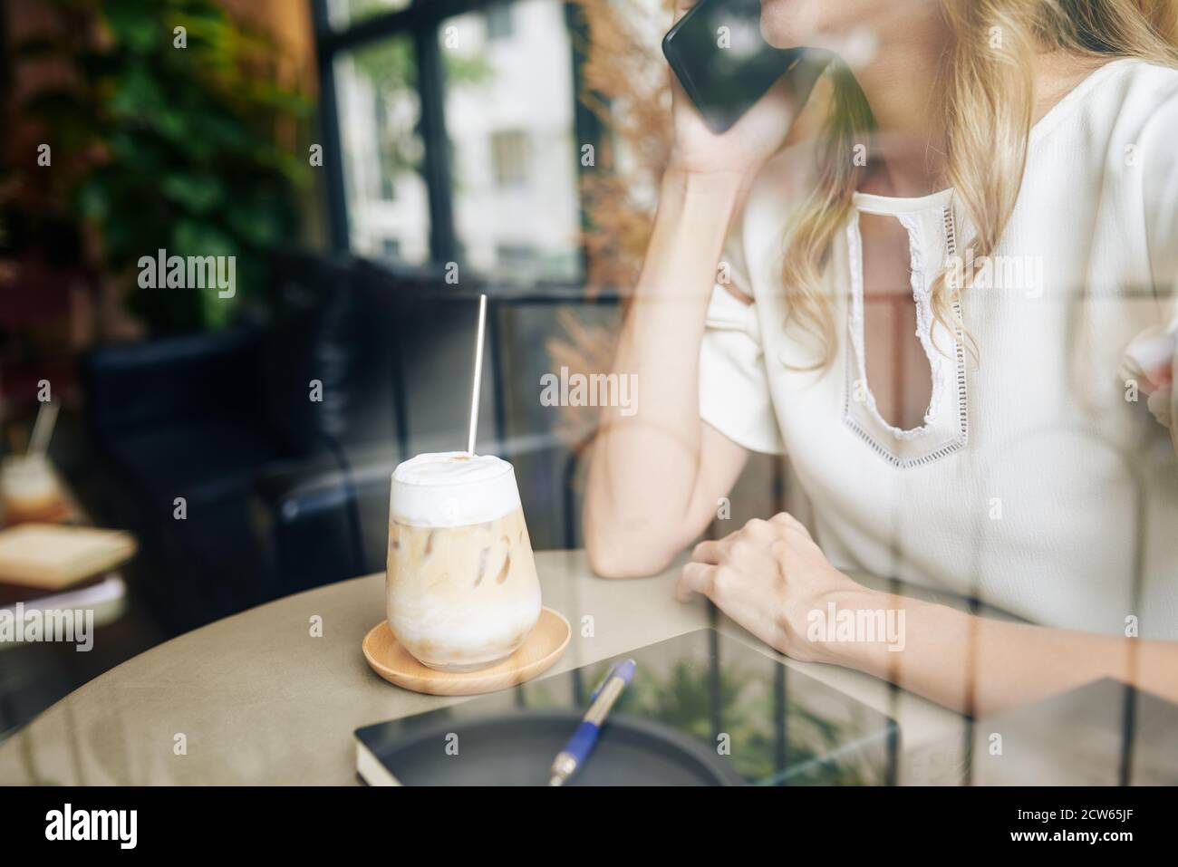 Drinking iced coffee hi-res stock photography and images - Alamy