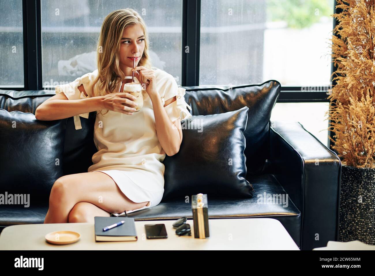 Drinking iced coffee hi-res stock photography and images - Alamy
