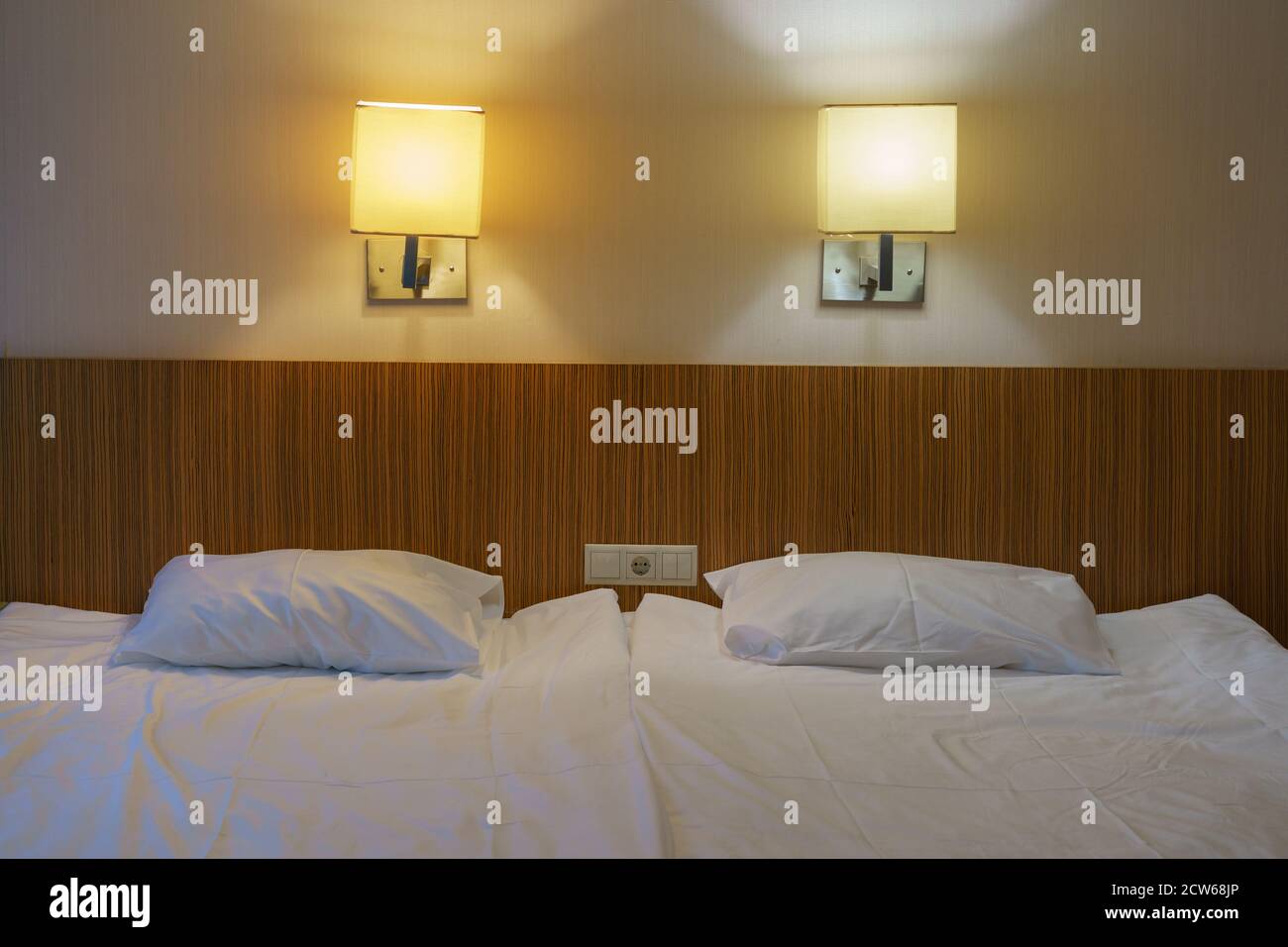Photography of the room interior in the modern middle class hotel. Two ...