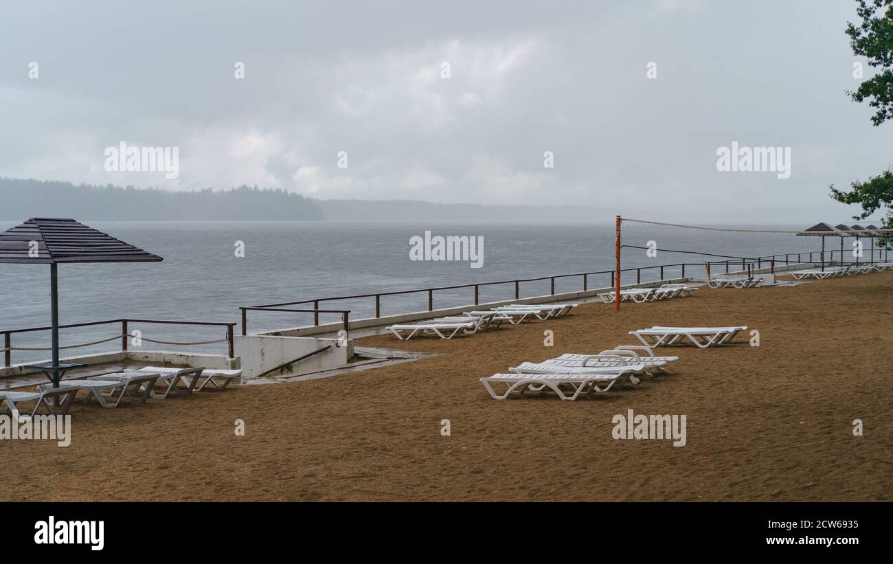 Domestic touristic resort in the cold rainy day. Holidays concept. Wet ...