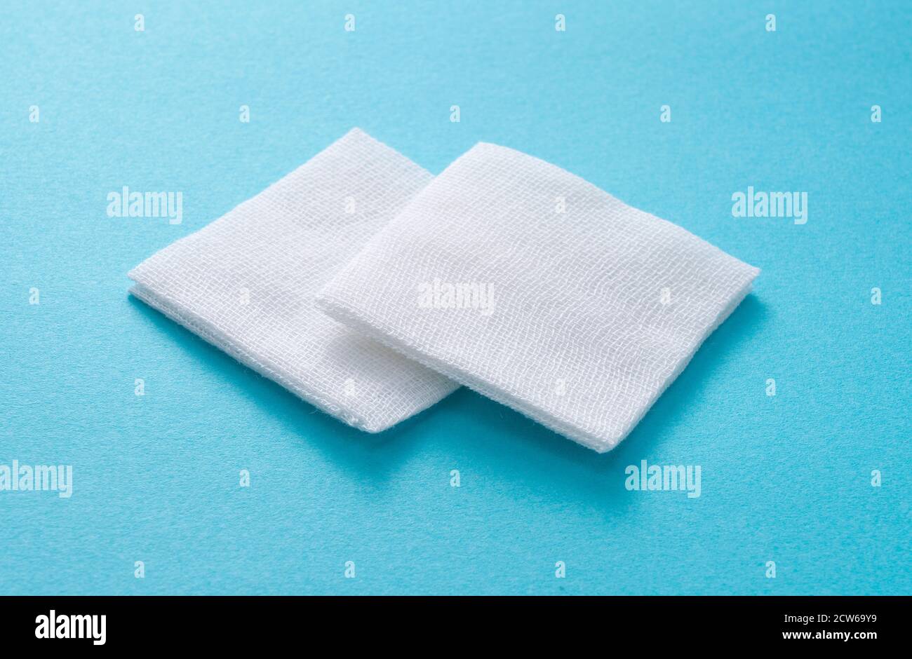 Gauze on a blue background Stock Photo - Alamy