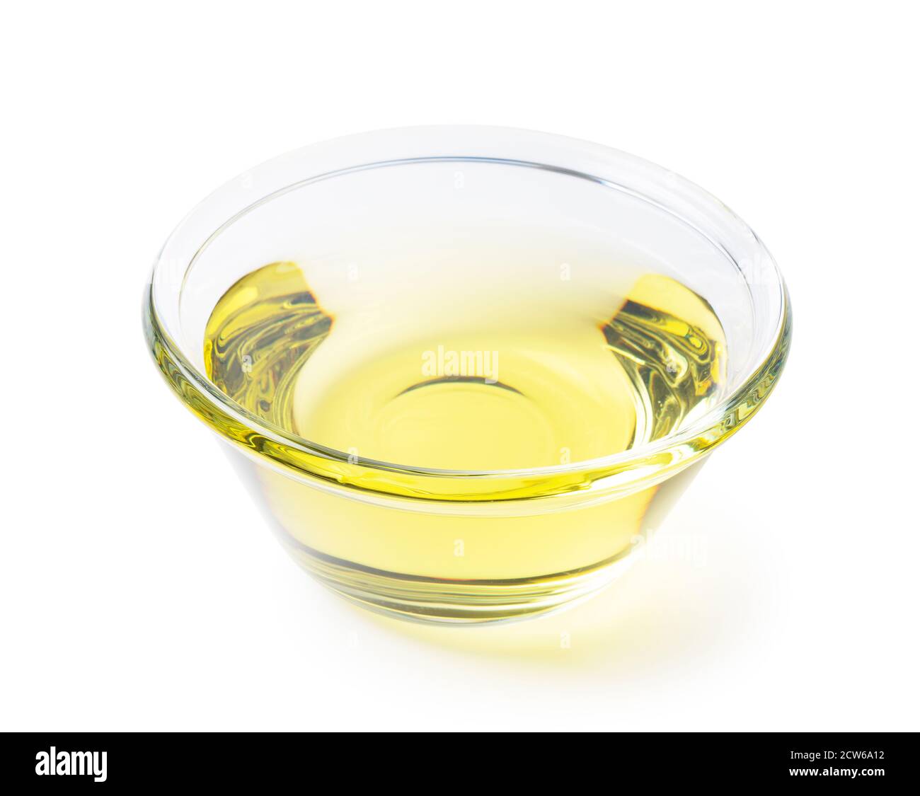 Vegetable oil in a glass bowl on a white background Stock Photo - Alamy