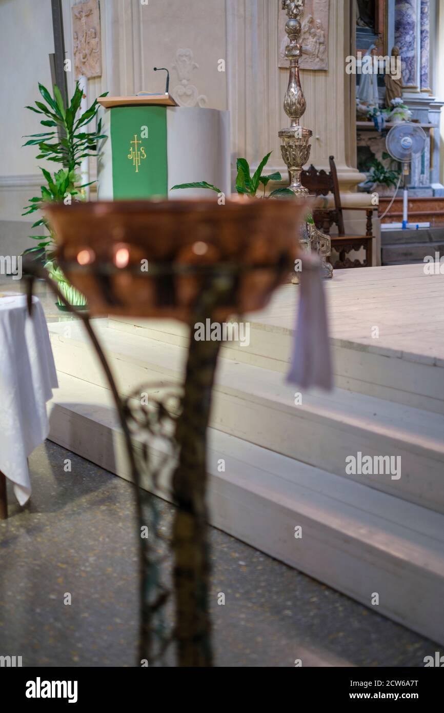 baptismal font in catholic church in italy for baptism in copper on ...