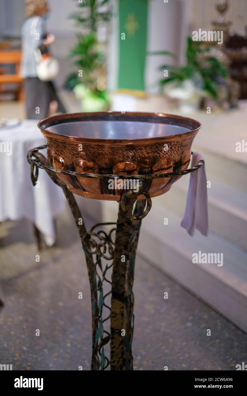baptismal font in catholic church in italy for baptism in copper on ...
