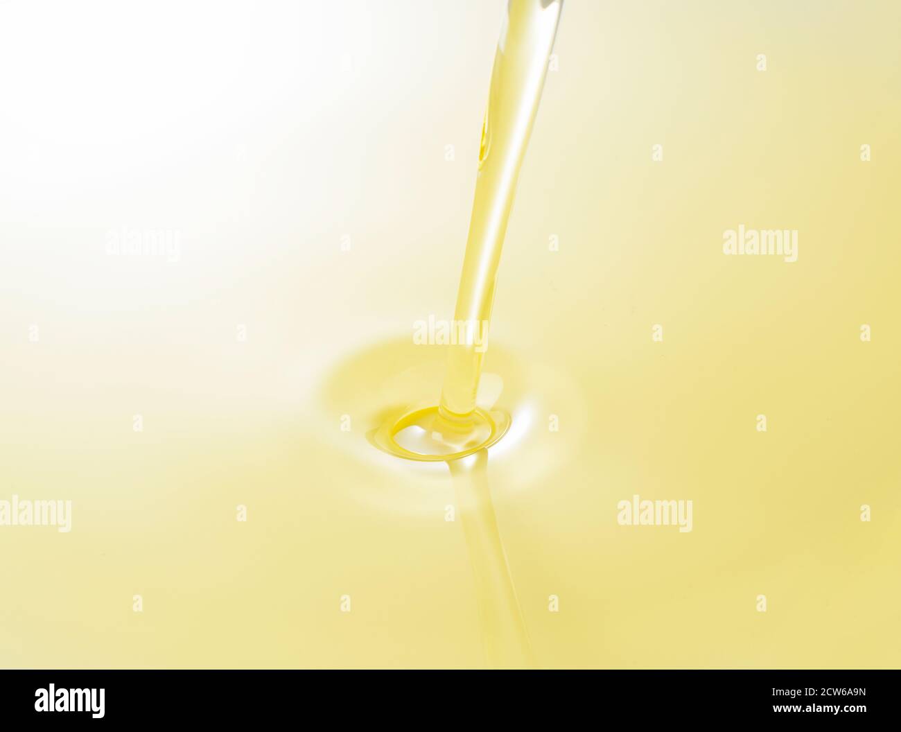 Close up cook pouring oil hi-res stock photography and images - Alamy