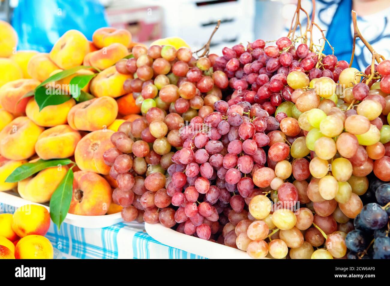 background of various grape varieties at the farmers ' market. the ...