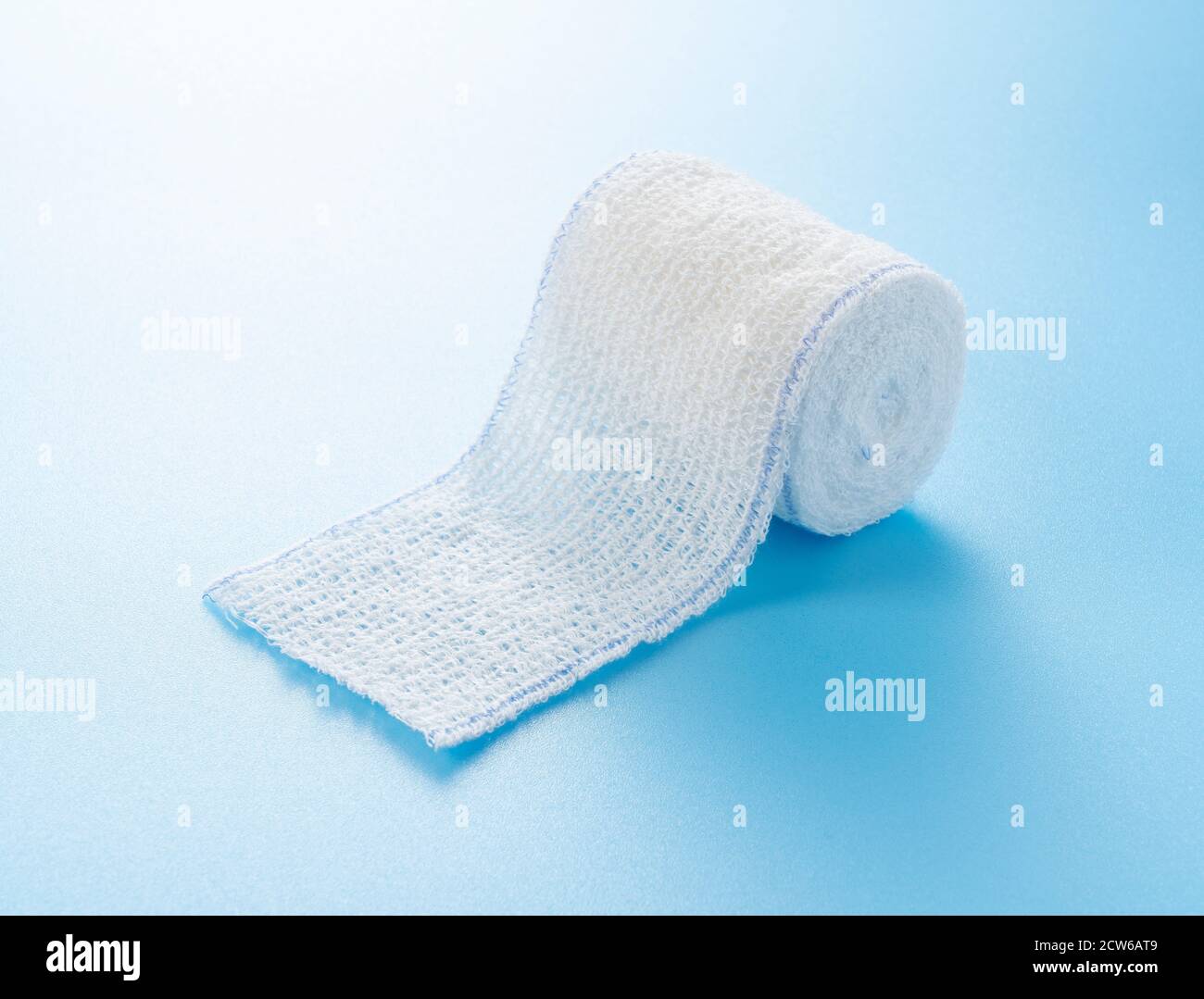 Bandages on a blue background Stock Photo - Alamy