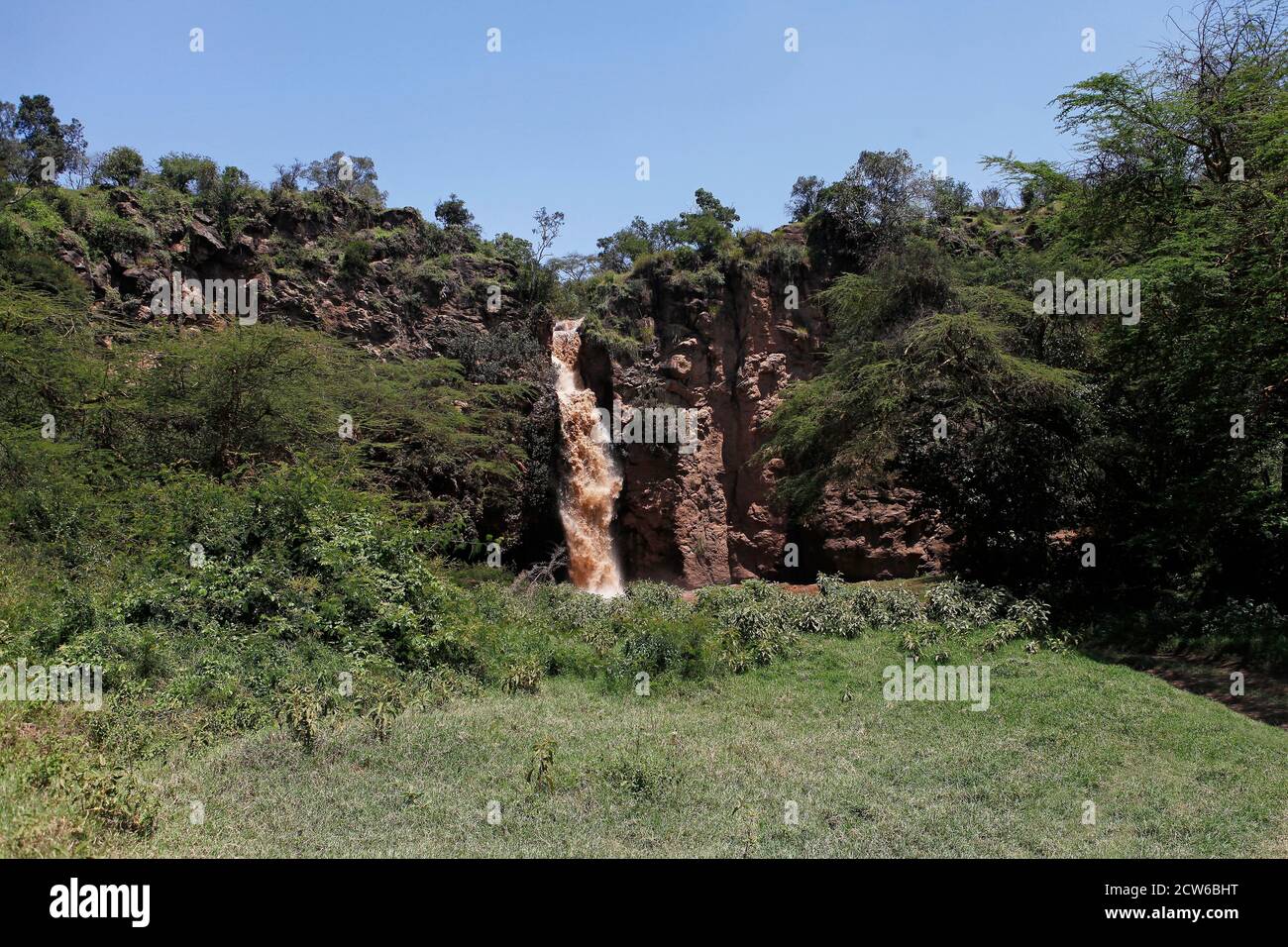 View of Waterfall, River draining into lake, Makalia Waterfall, Lake ...