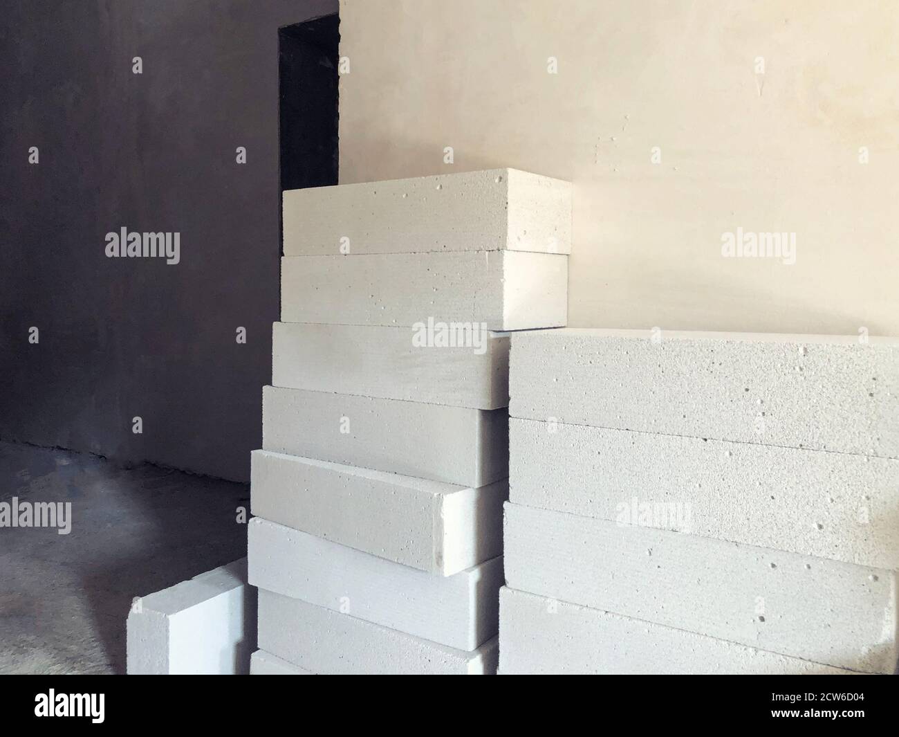 Piled cinder blocks on the floor building at the construction site ...