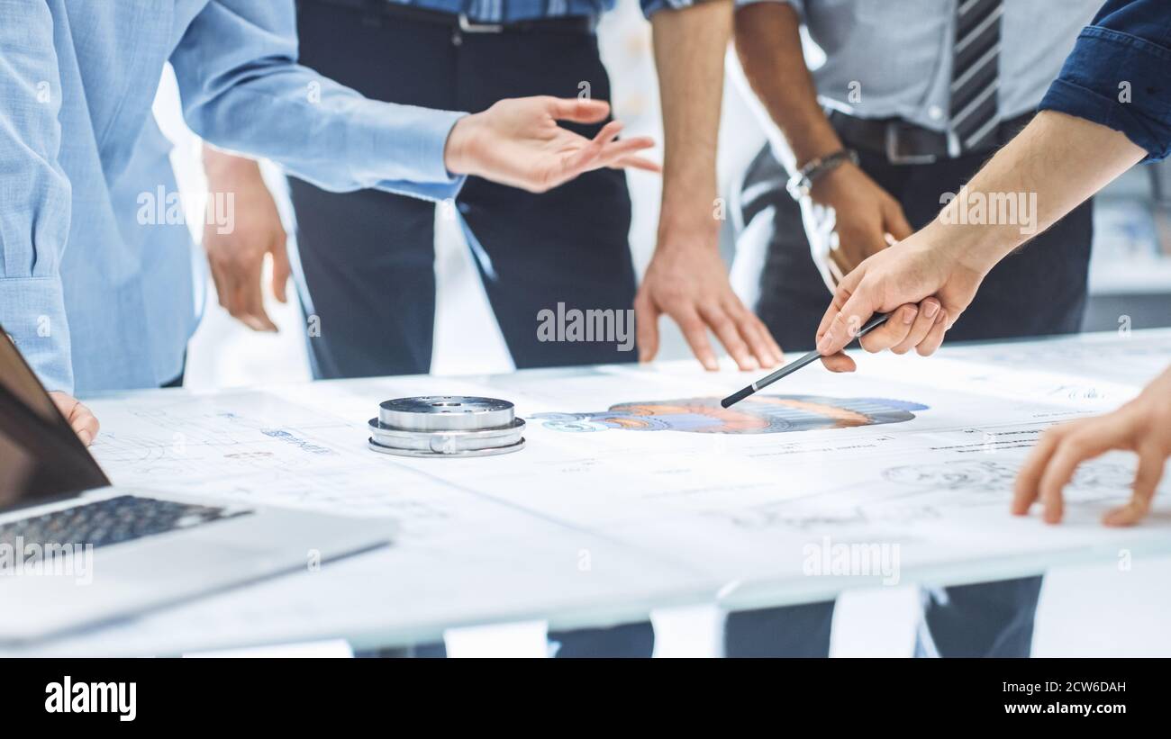 Industrial Engineering Facility: Close-up on Hands of Group of ...