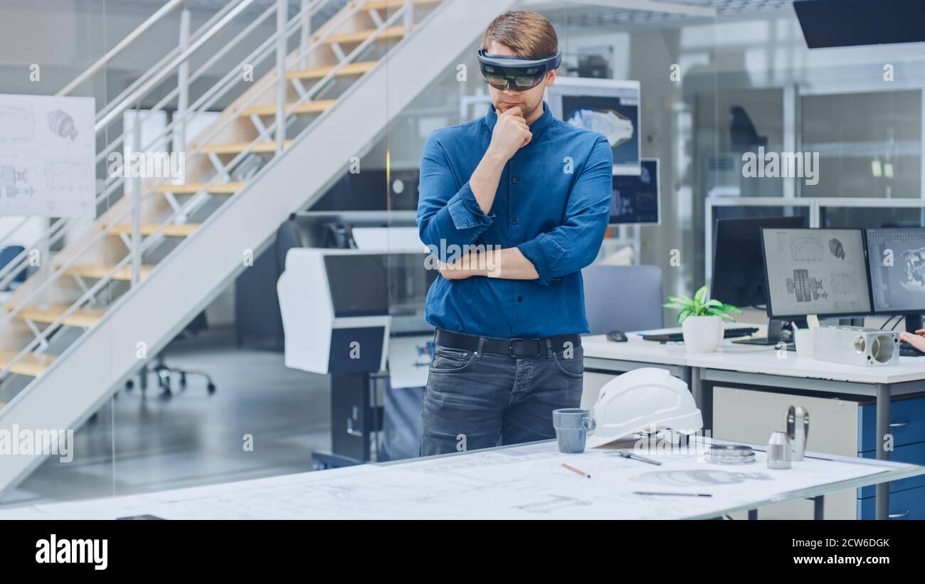 Engineering Software Developer Wearing Virtual Reality Headset Uses ...