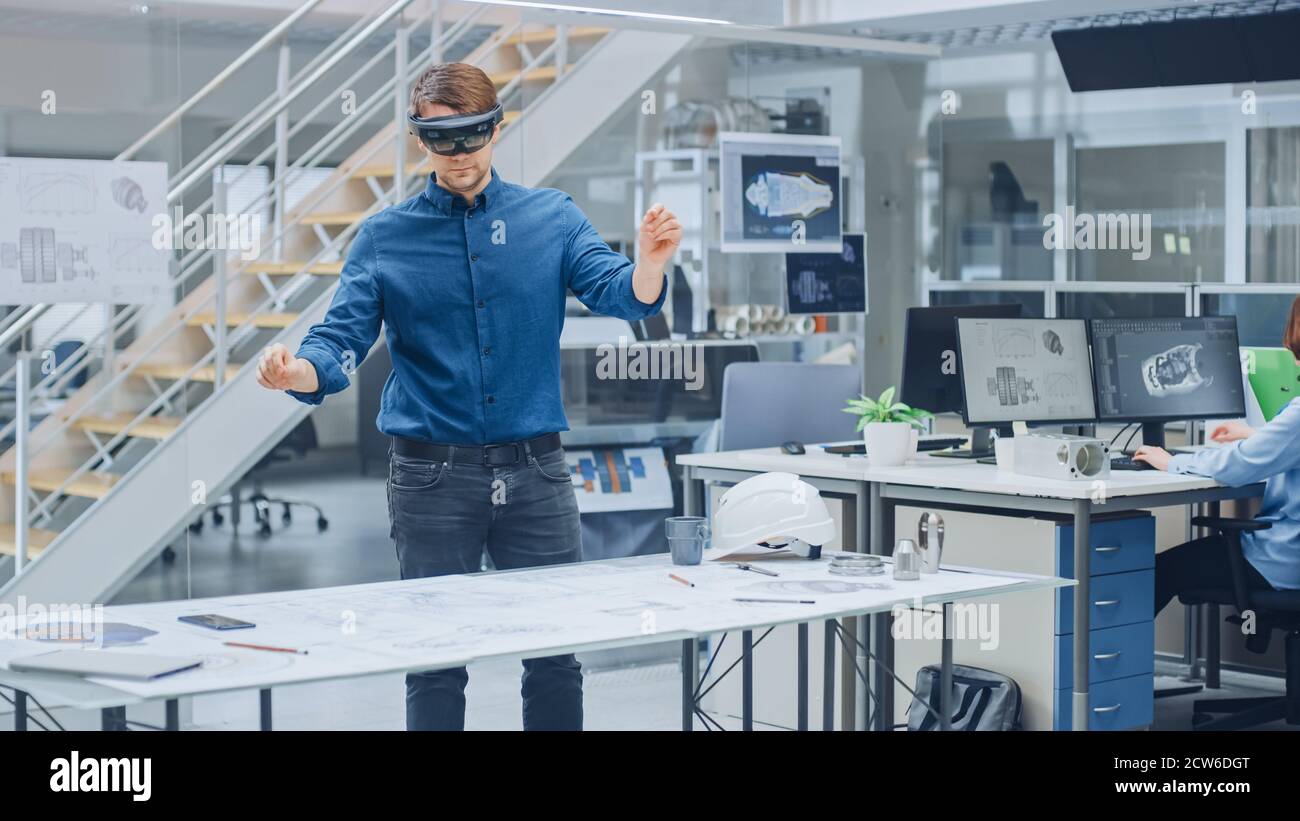 Engineering Software Developer Wearing Virtual Reality Headset Uses ...