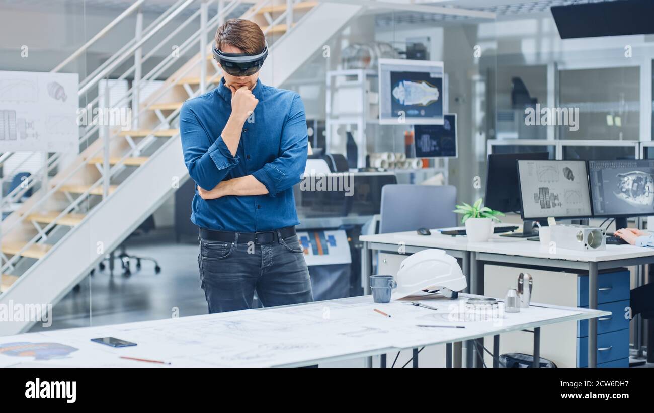 Engineering Software Developer Wearing Virtual Reality Headset Uses ...