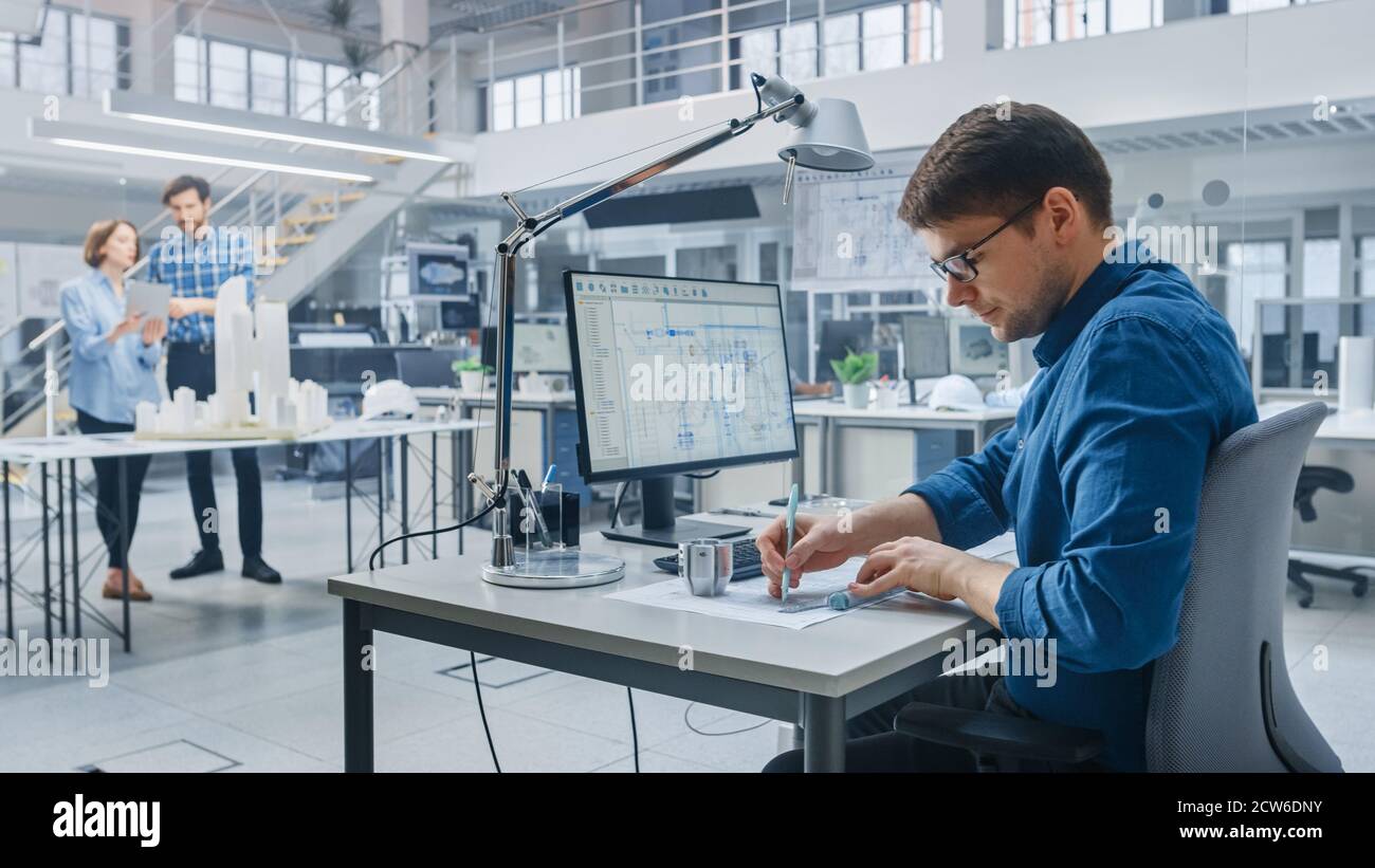 In Architectural Bureau: Team of Architects and Engineers Working on a ...