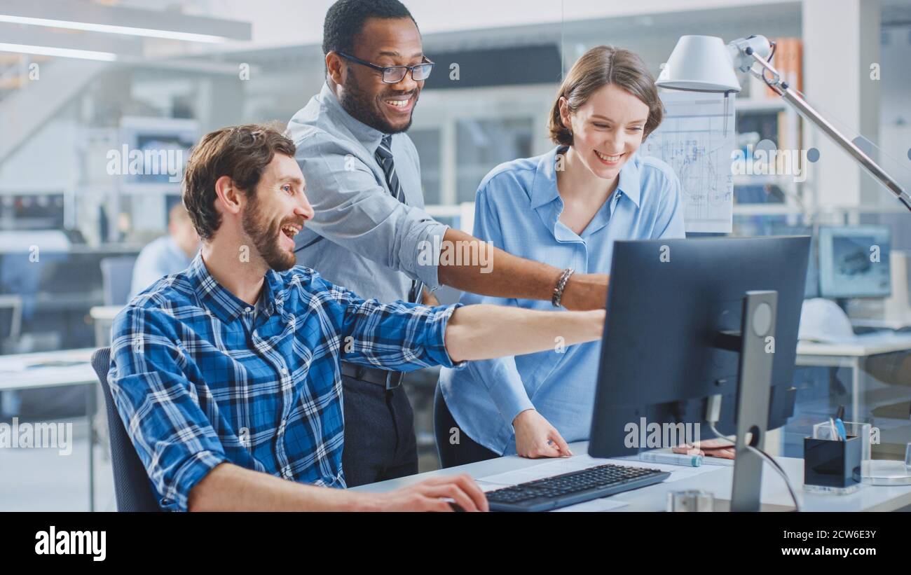 In the Industrial Engineering Facility: Male Engineer Working on ...
