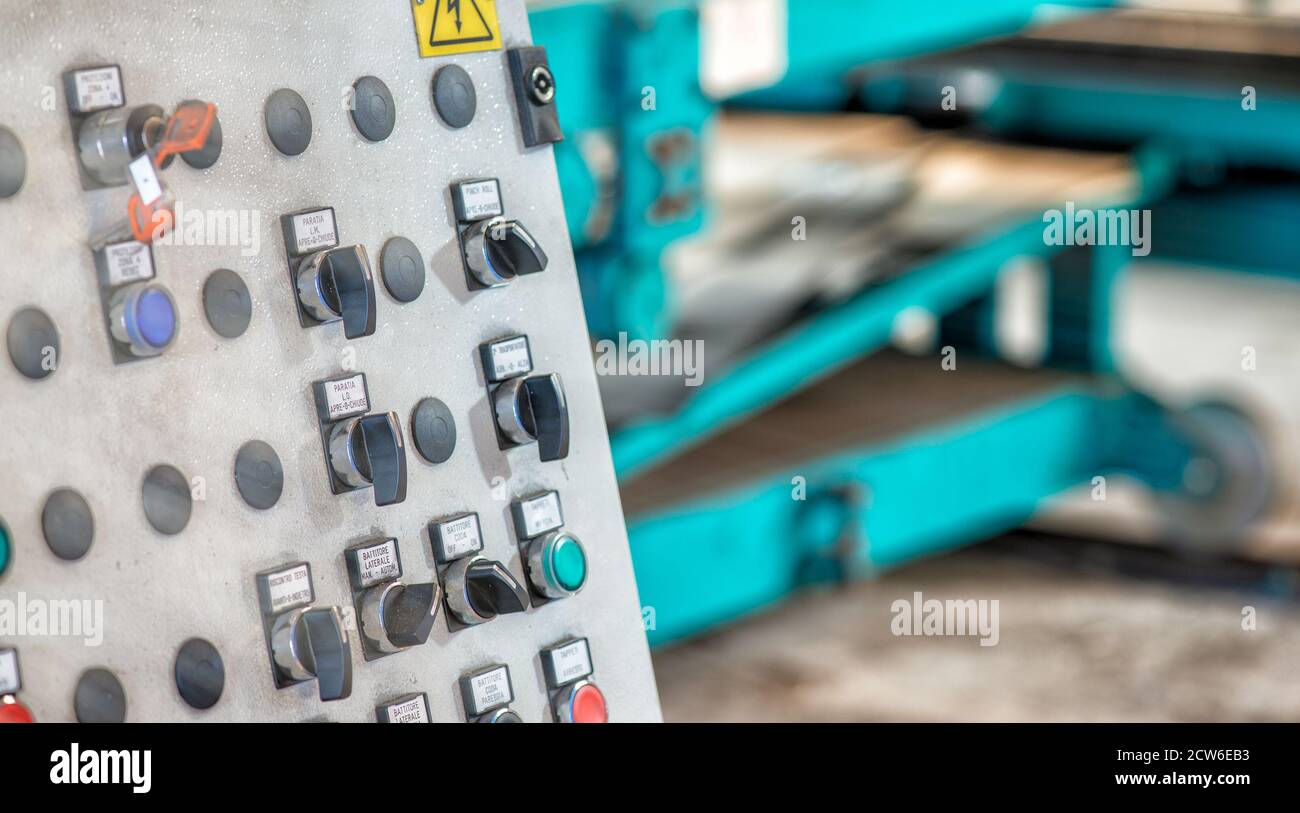 Button on the control equipment in a warehouse Stock Photo - Alamy