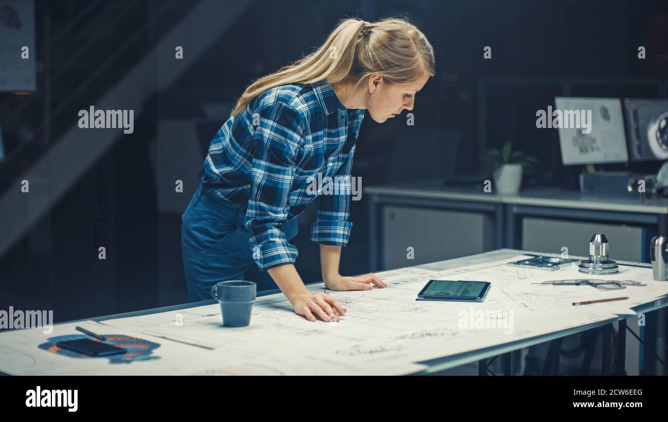 In the Dark Industrial Design Engineering Facility: Female Engineer ...