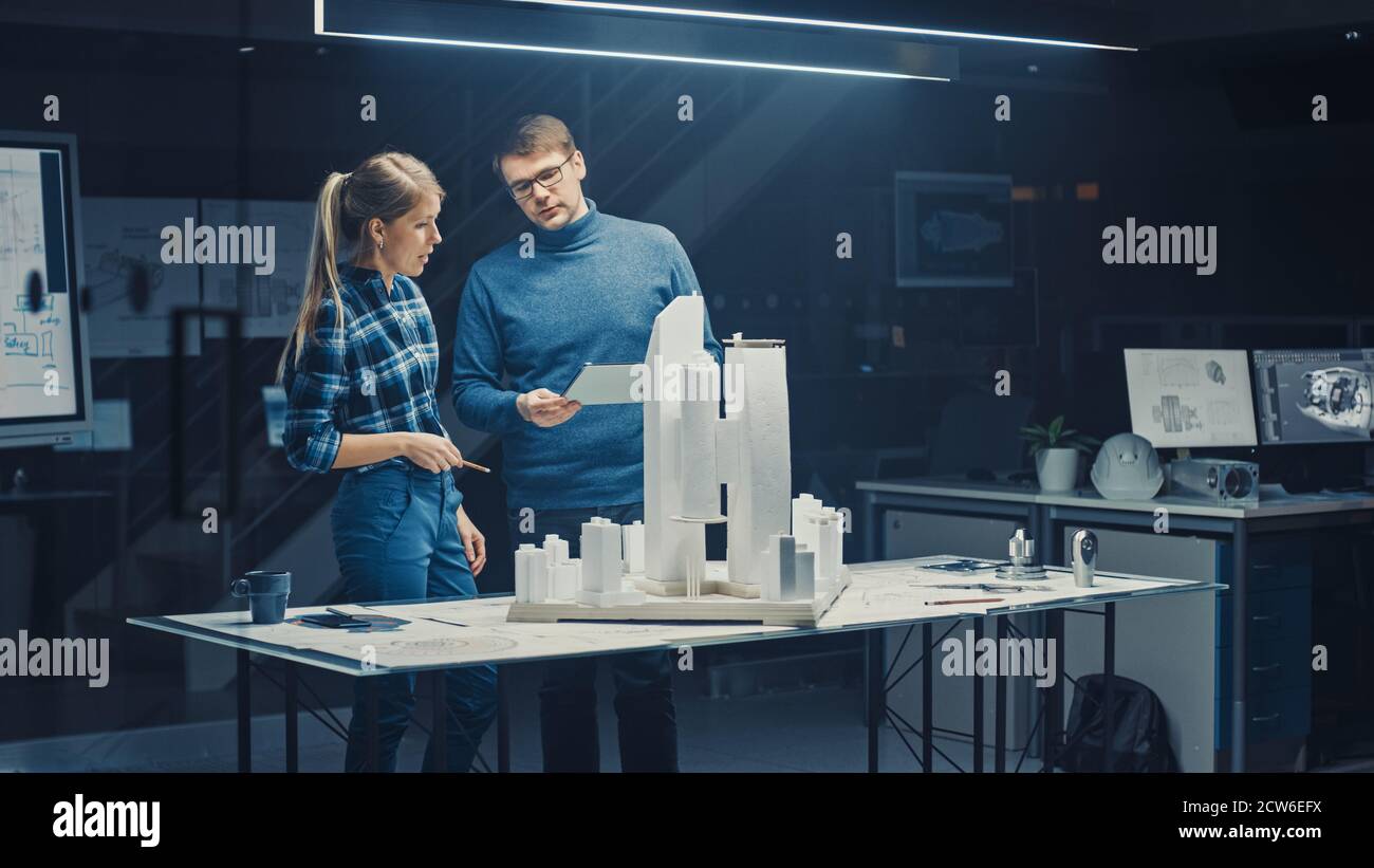 In the Creative Architectural Bureau Two Professional Engineers Work on ...