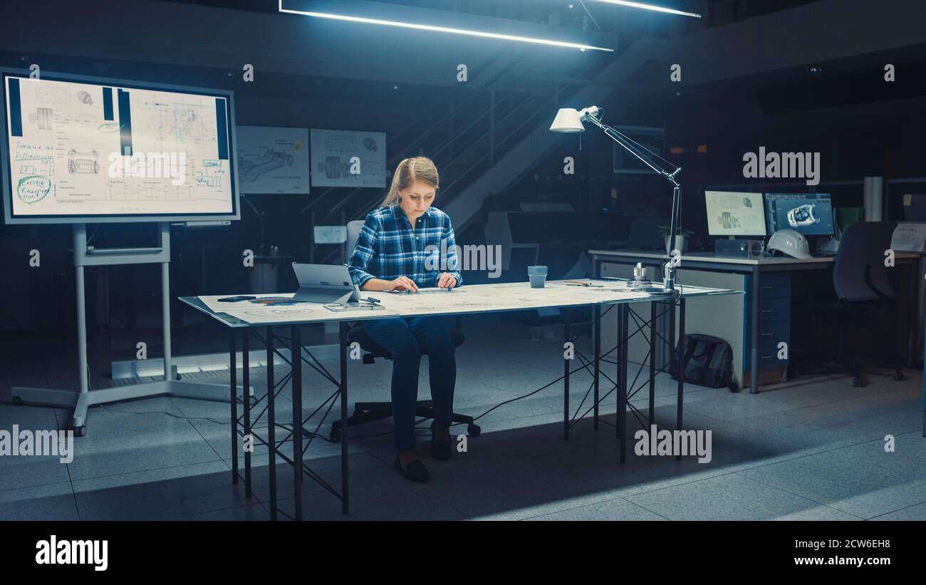 Female engineer sitting desk works hi-res stock photography and images ...