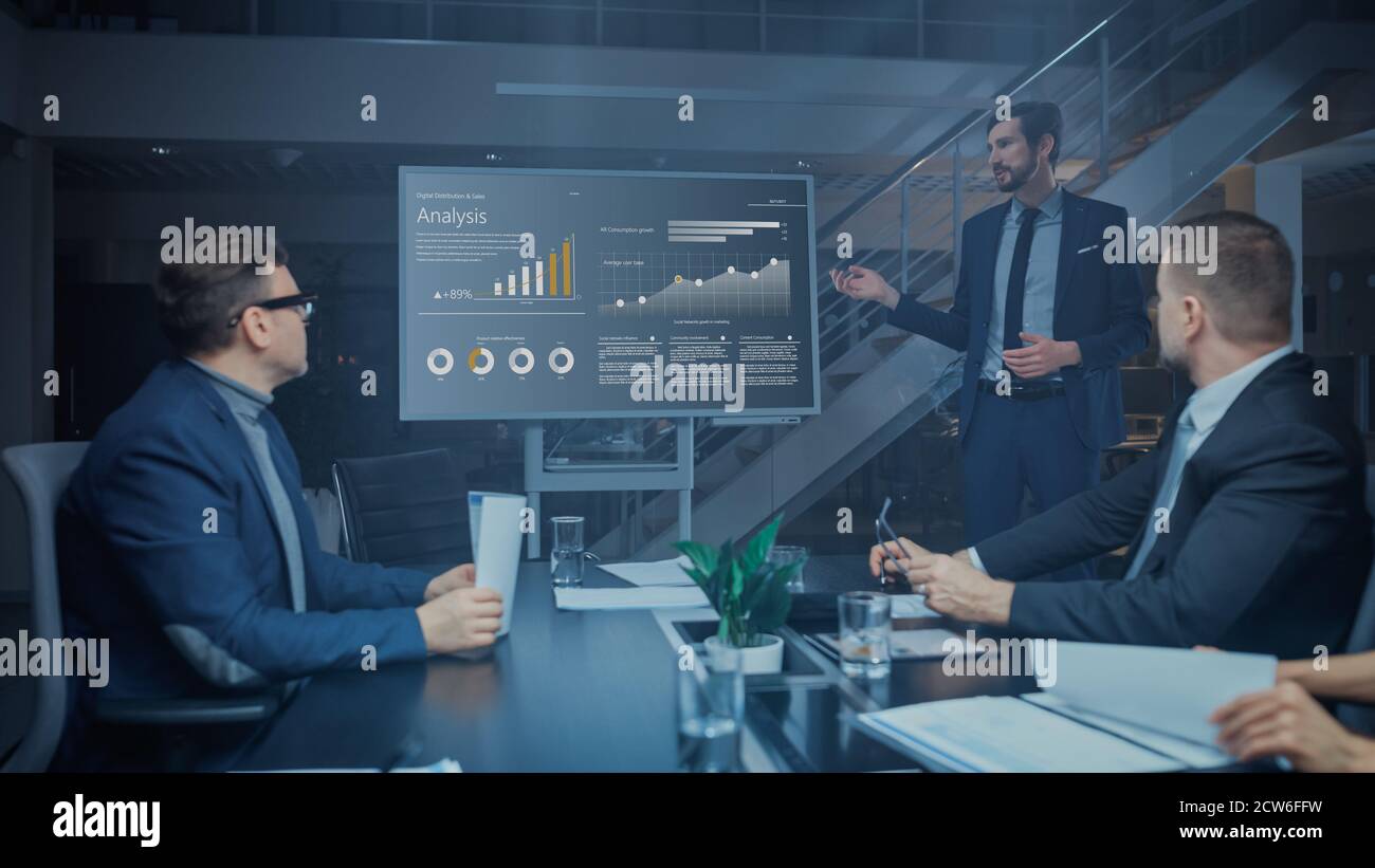 In the Corporate Meeting Room: Male Executive Talks and Uses Digital ...