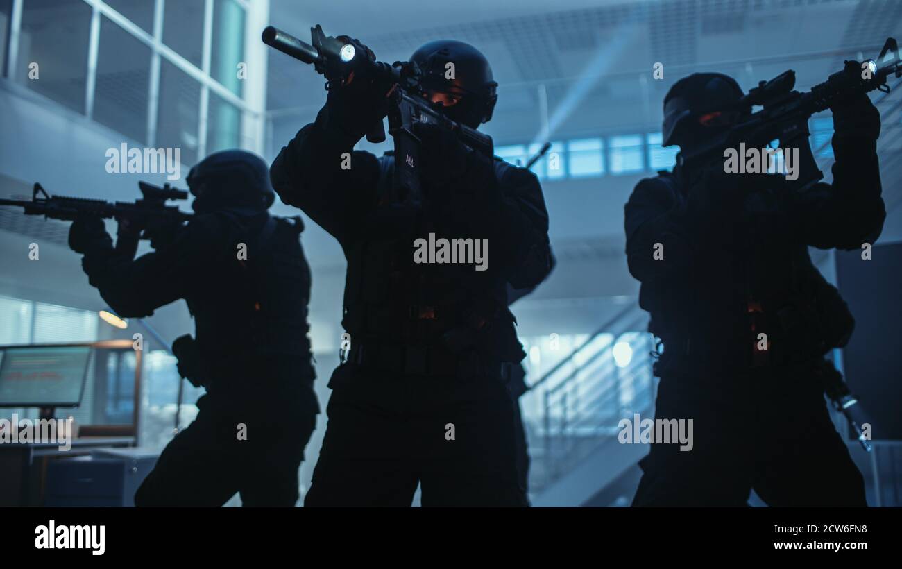 Masked Squad of Armed SWAT Police Officers Stand in Dark Seized Office ...
