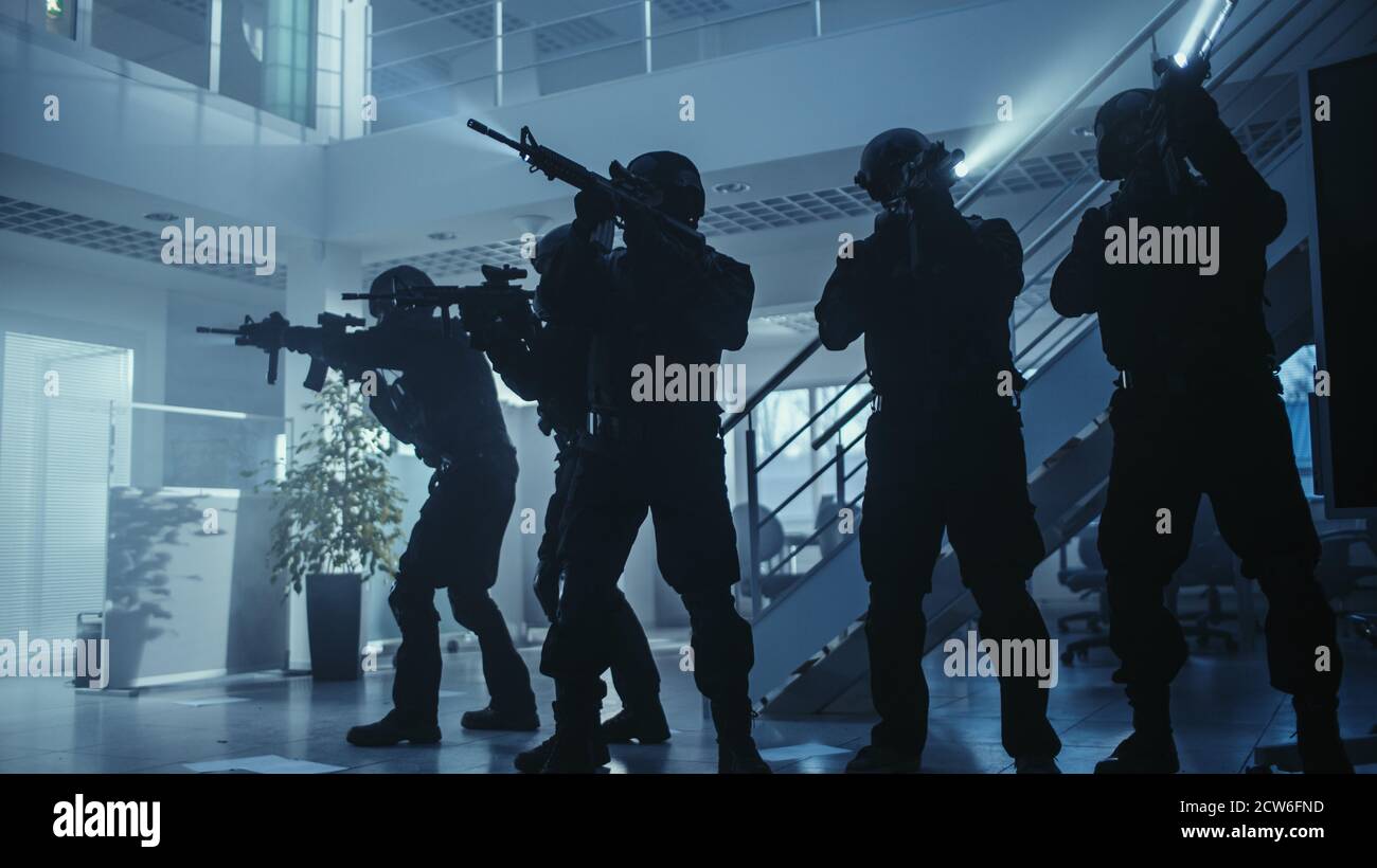 Masked Squad of Armed SWAT Police Officers Stand in Dark Seized Office ...