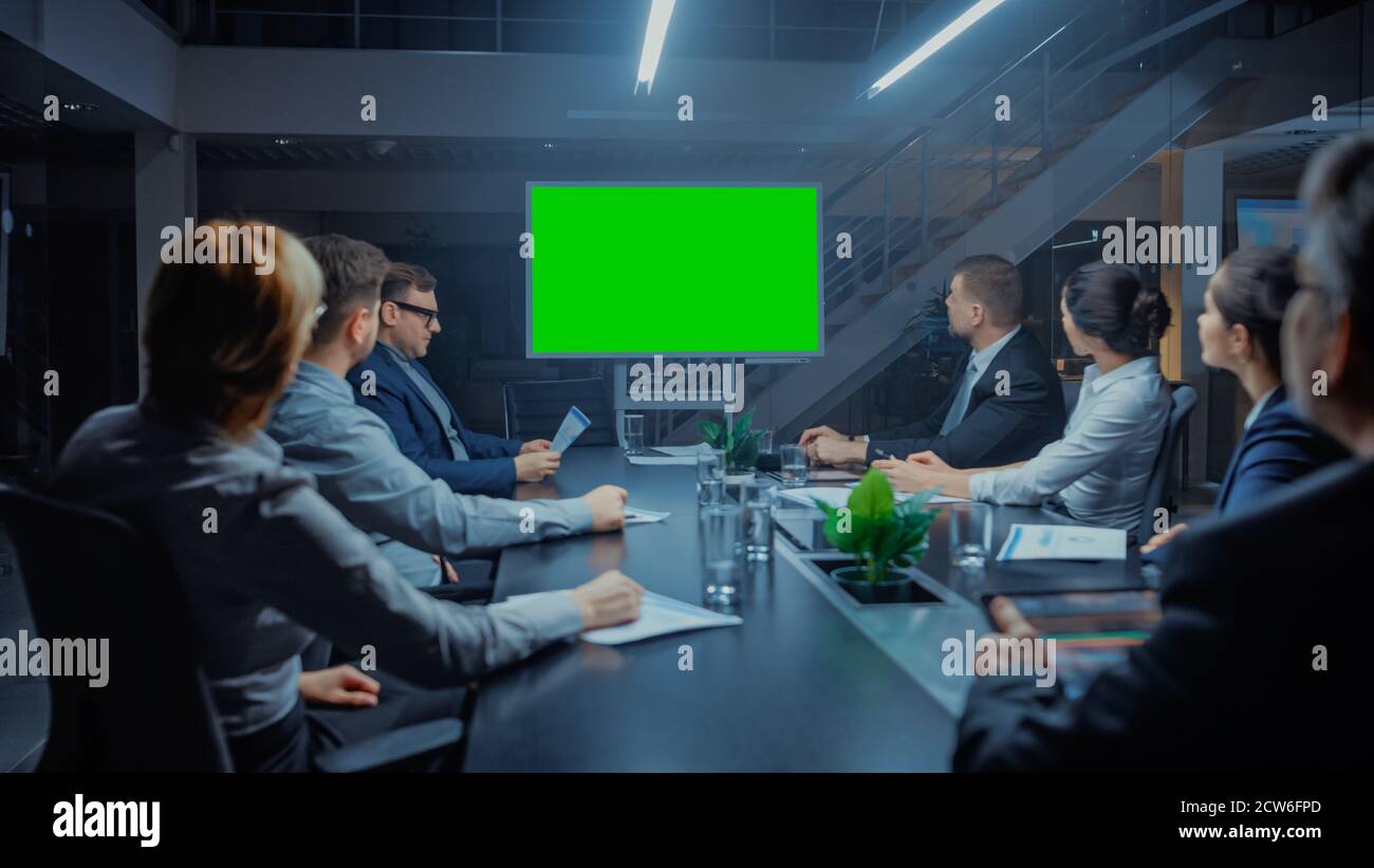 Late at Night In Corporate Meeting Room: Board of Directors, Executives ...