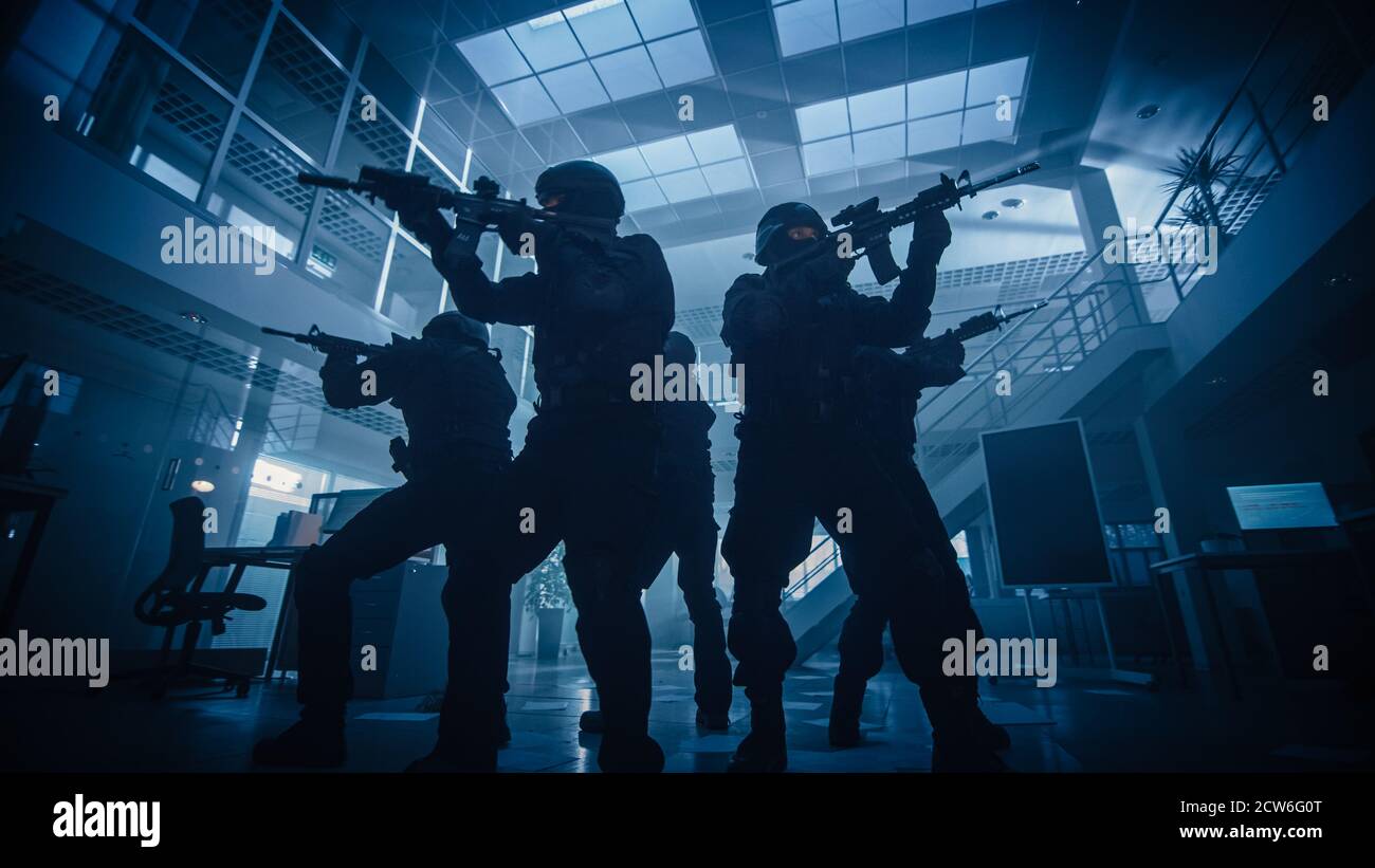 Masked Squad of Armed SWAT Police Officers Stand in Dark Seized Office ...