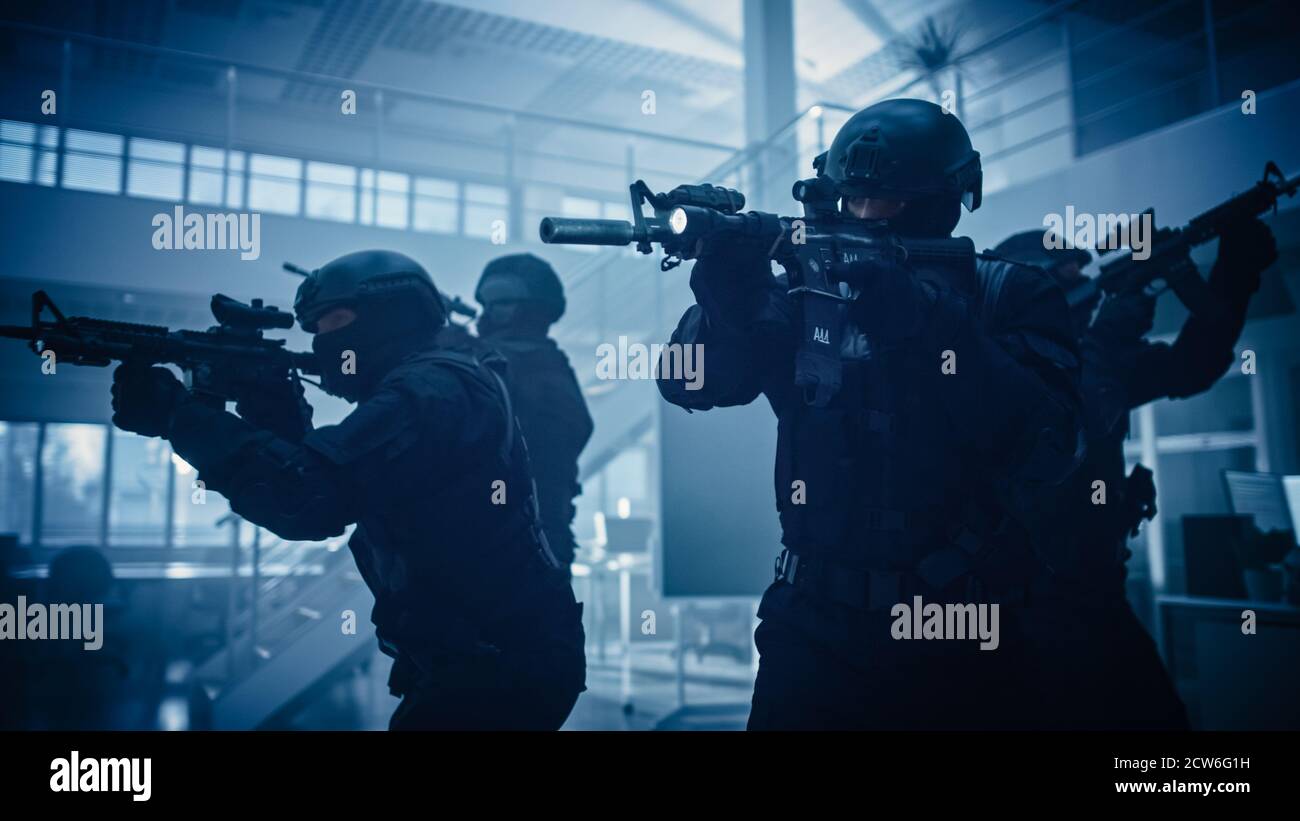 Close Up Portraits of Masked Squad of Armed SWAT Police Officers Storm ...