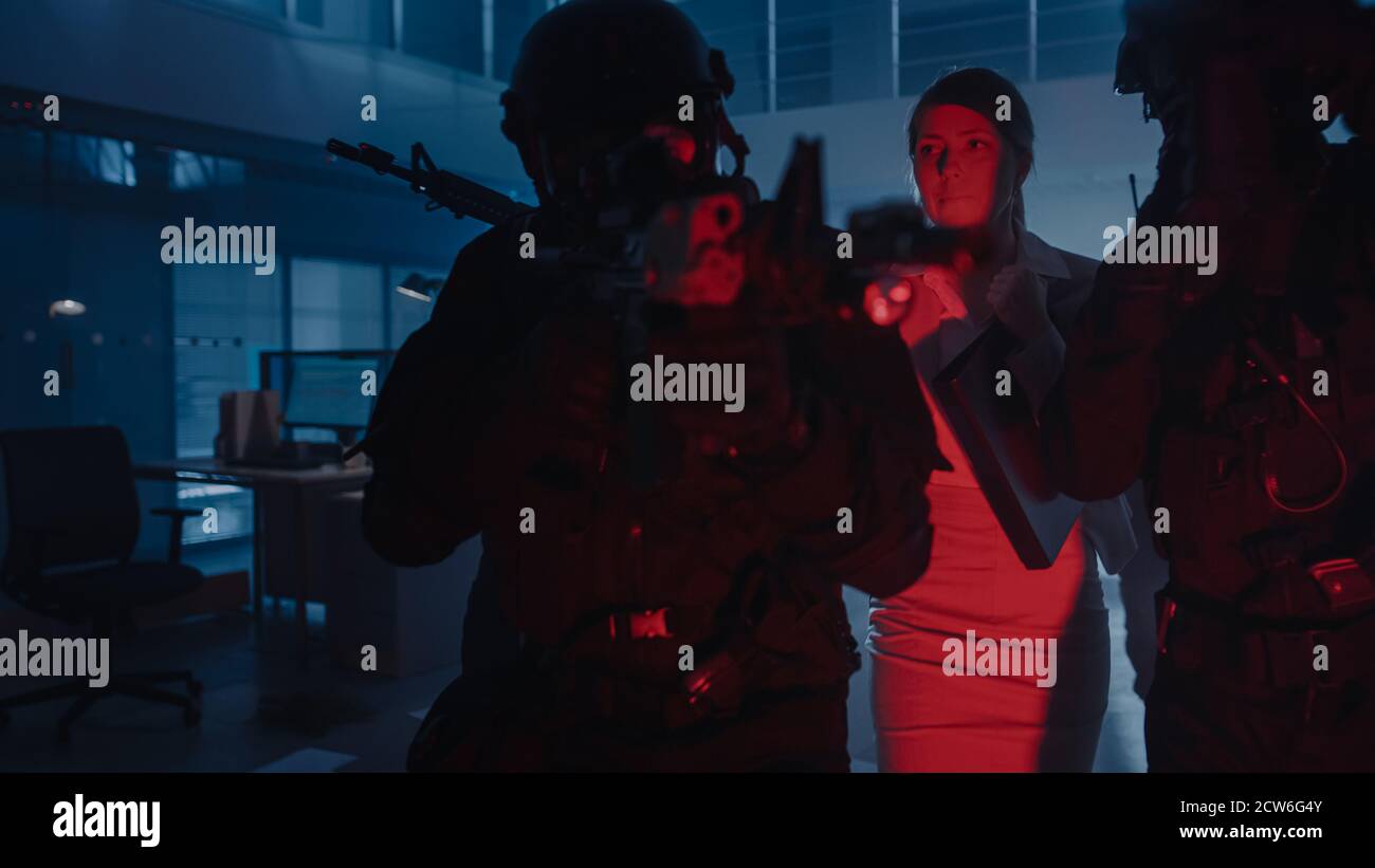 Masked Squad of Armed SWAT Police Officers Rescue a Female Hostage in a ...