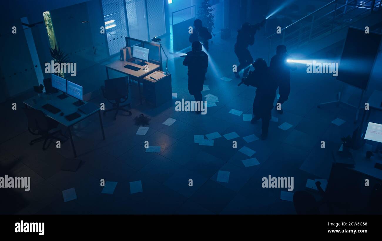 Masked Squad of Armed SWAT Police Officers Storm a Dark Seized Office ...