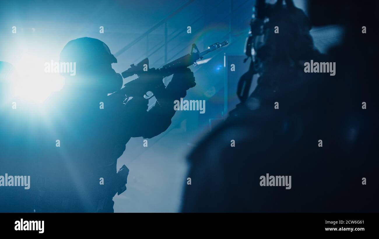 Close Up Portraits of Masked Squad of Armed SWAT Police Officers Storm ...