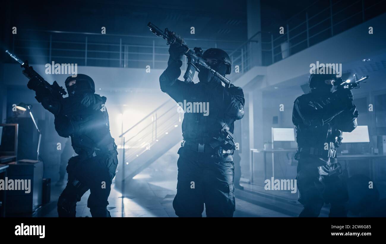 Masked Squad of Armed SWAT Police Officers Stand in Dark Seized Office ...