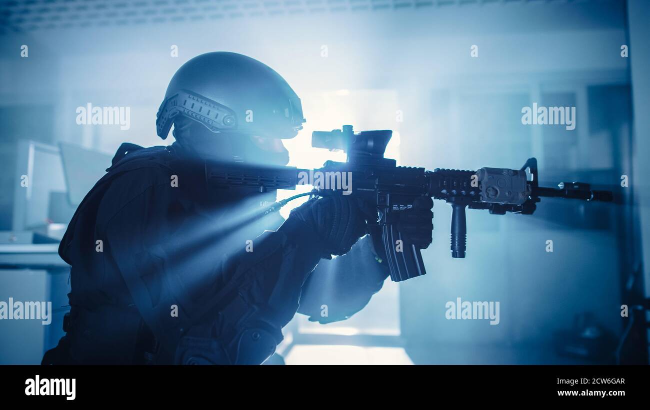 Close Up Portrait of Masked Squad Member of Armed SWAT Police Officers ...