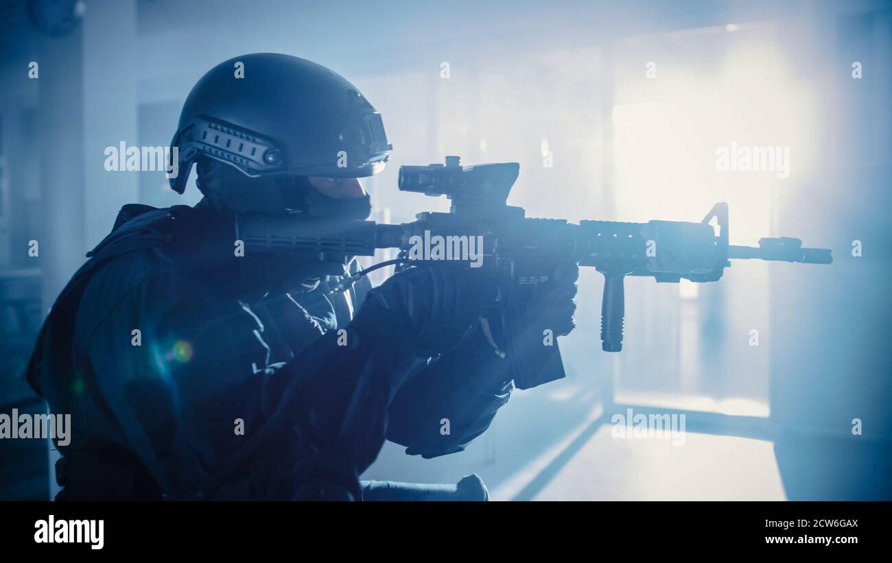 Close Up Portrait of Masked Squad Member of Armed SWAT Police Officers ...