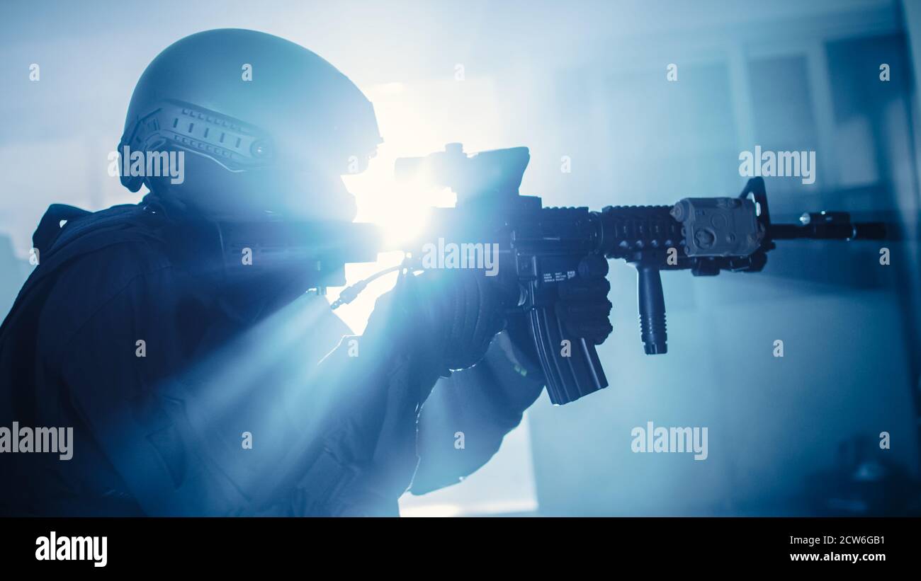 Close Up Portrait of Masked Squad Member of Armed SWAT Police Officers ...