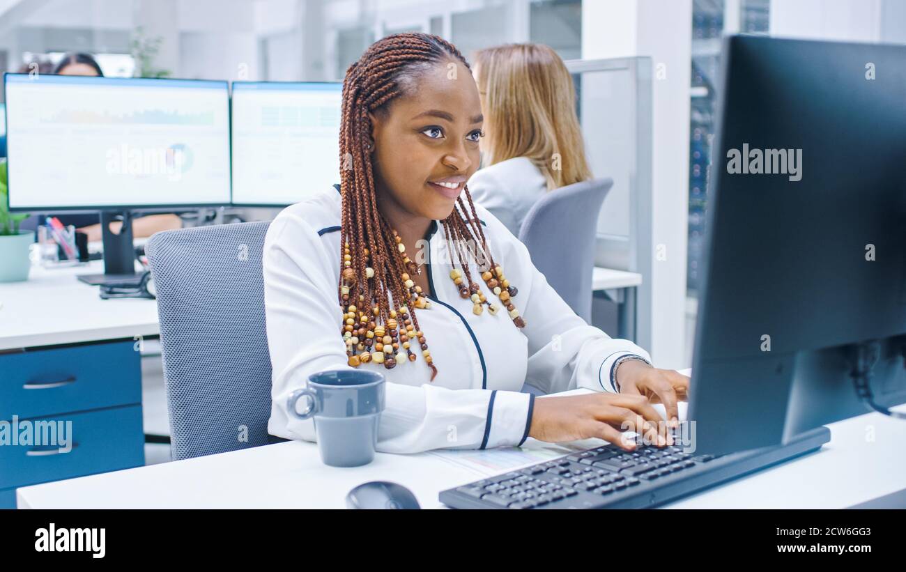 In the Big Busy Corporate Office African American Businesswoman Works ...