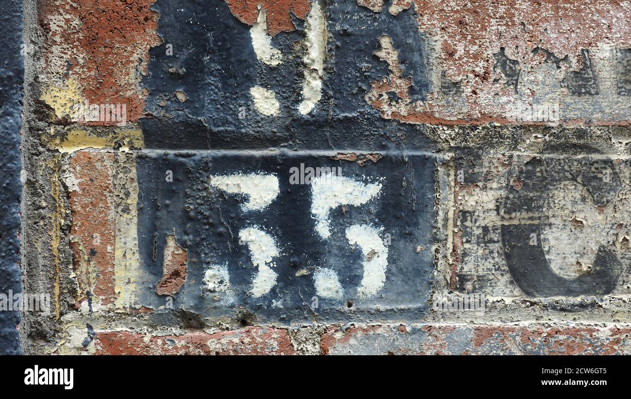 Old signage on red bricks Stock Photo - Alamy