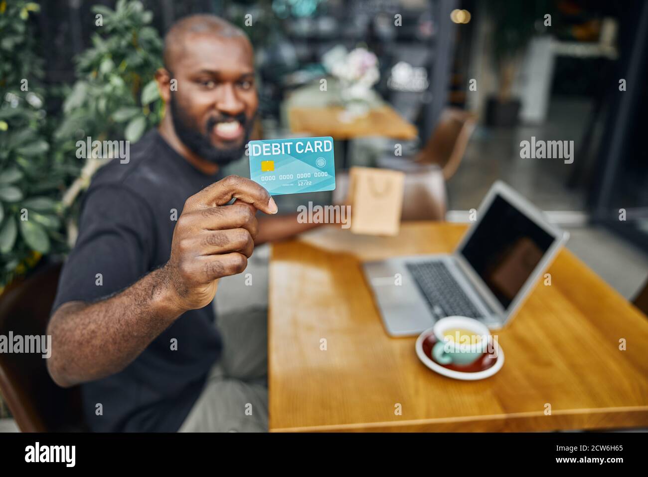 Contented person satisfied with his reliable bank Stock Photo - Alamy
