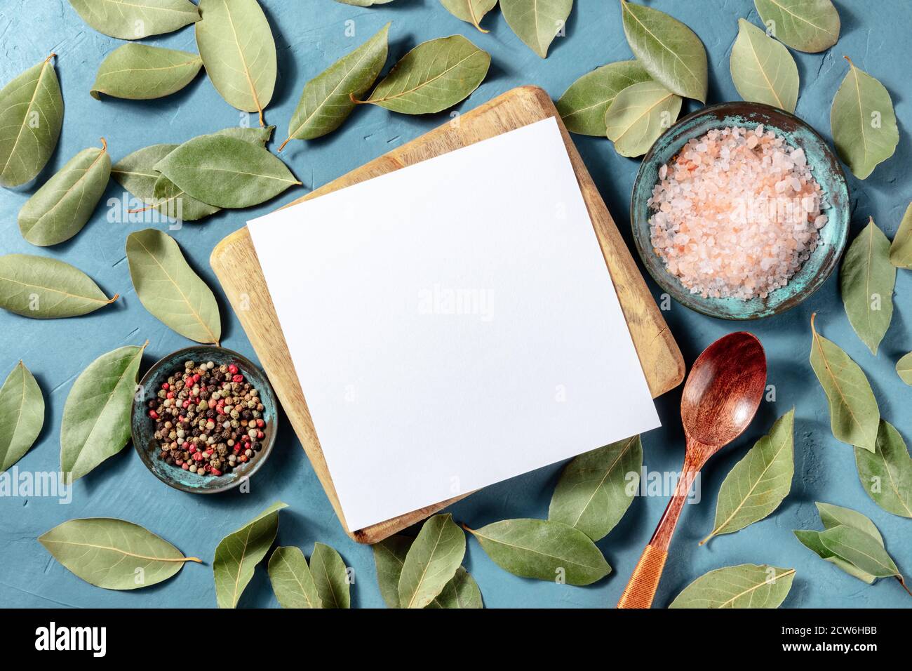 Recipe design template, paper in the kitchen with salt, pepper, and bay ...