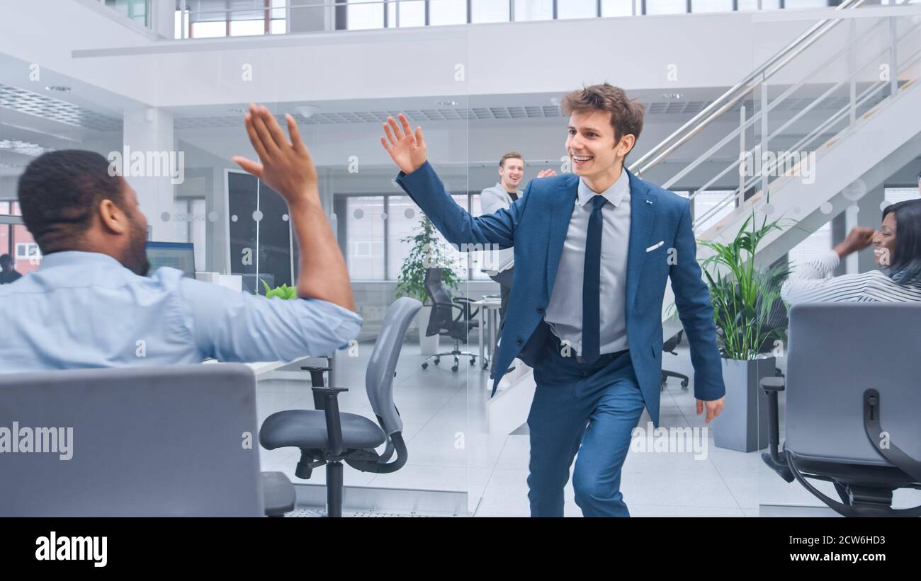 Happy employee clapping dancing hi-res stock photography and images - Alamy