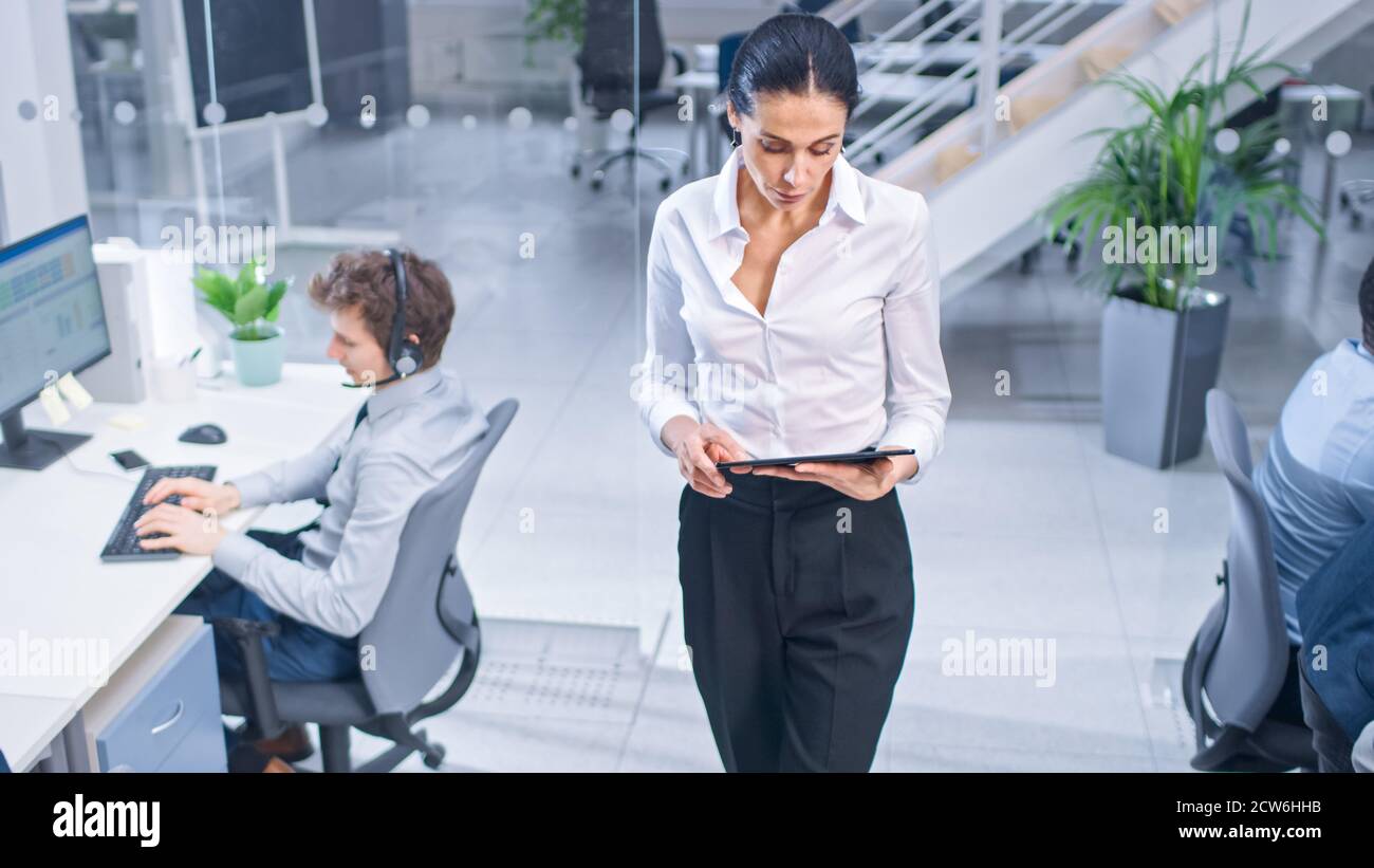 Beautiful Female Manager is Walking Pass Her Customer Service Operator ...