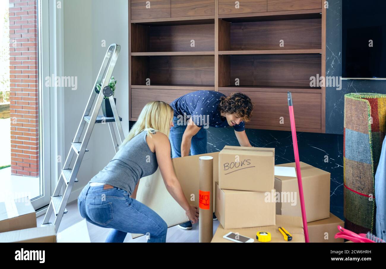 Carrying heavy furniture hi-res stock photography and images - Alamy