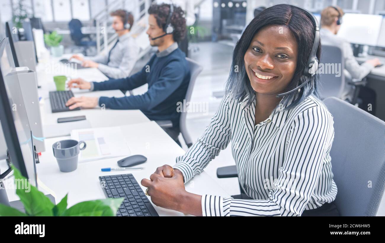 Beautiful Young Female Customer Service Operator Smiling for a Portrait ...