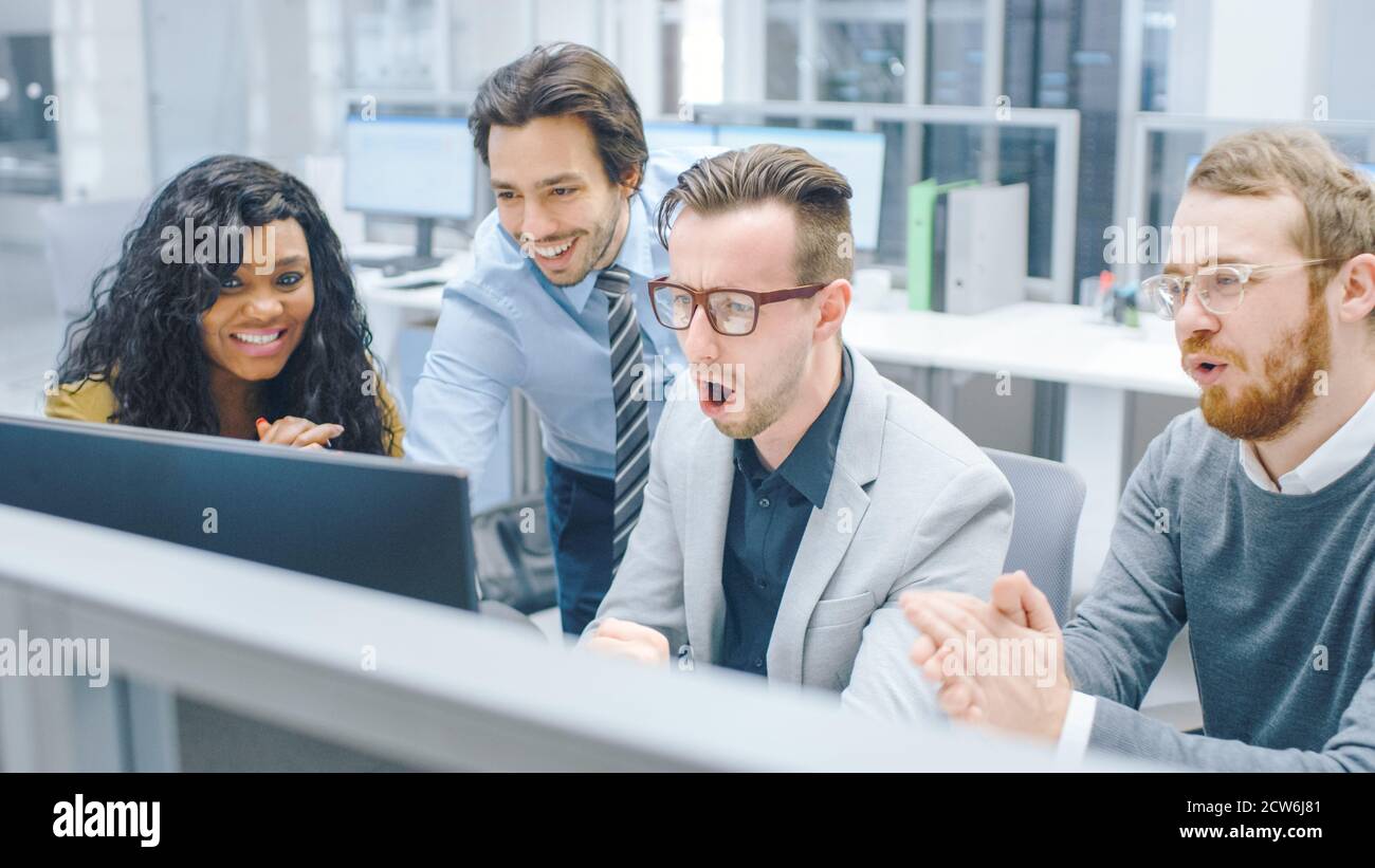 In Modern Office: Diverse Team of Young Motivated Businessmen and ...