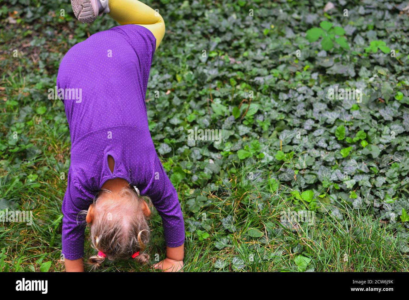 Headstand kid hi-res stock photography and images - Alamy