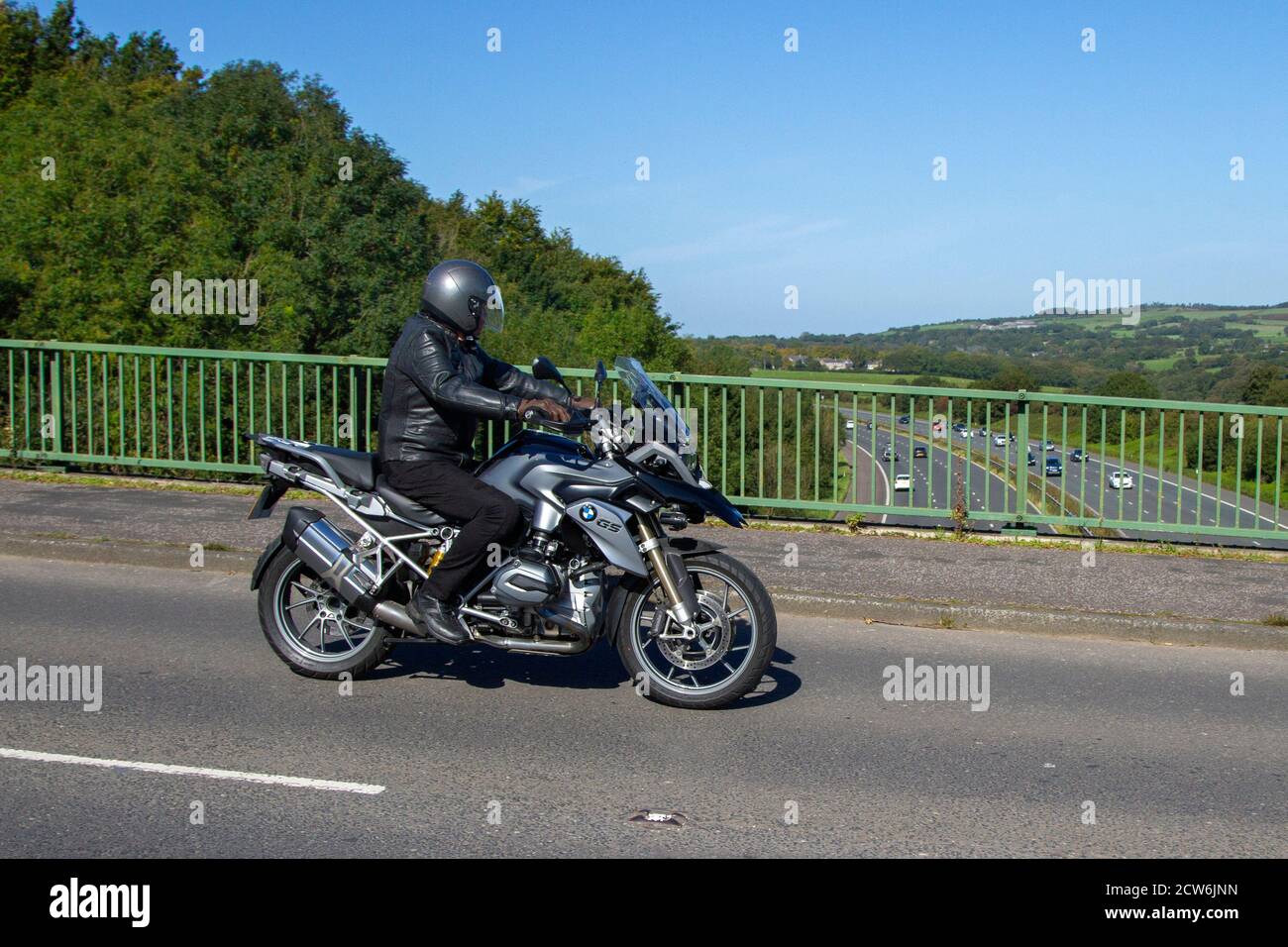 RK64XXW 2014 Black BMW R 1200 GS; Motorbike rider; two wheeled ...